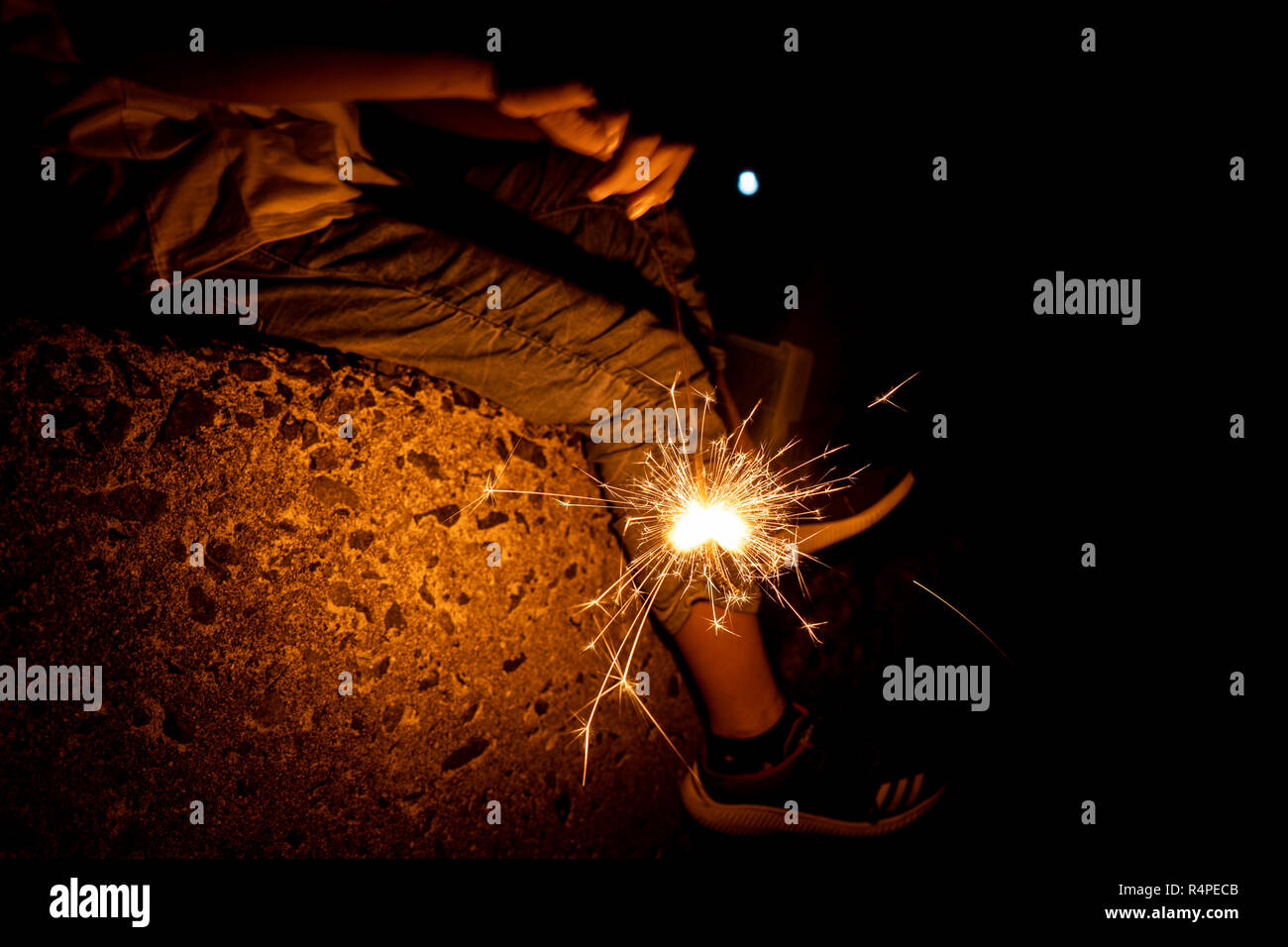 Kids Playing Fireworks Stock Photo - Alamy