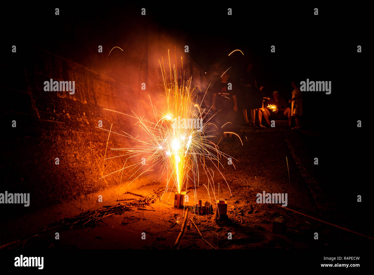 Kids Playing Fireworks Stock Photo - Alamy