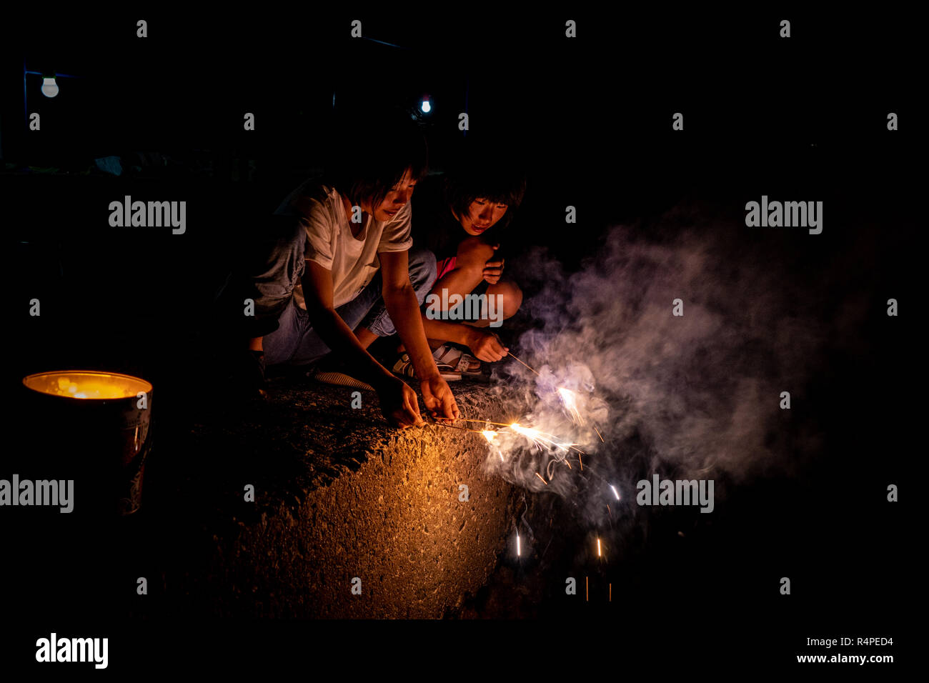Kids Playing Fireworks Stock Photo - Alamy