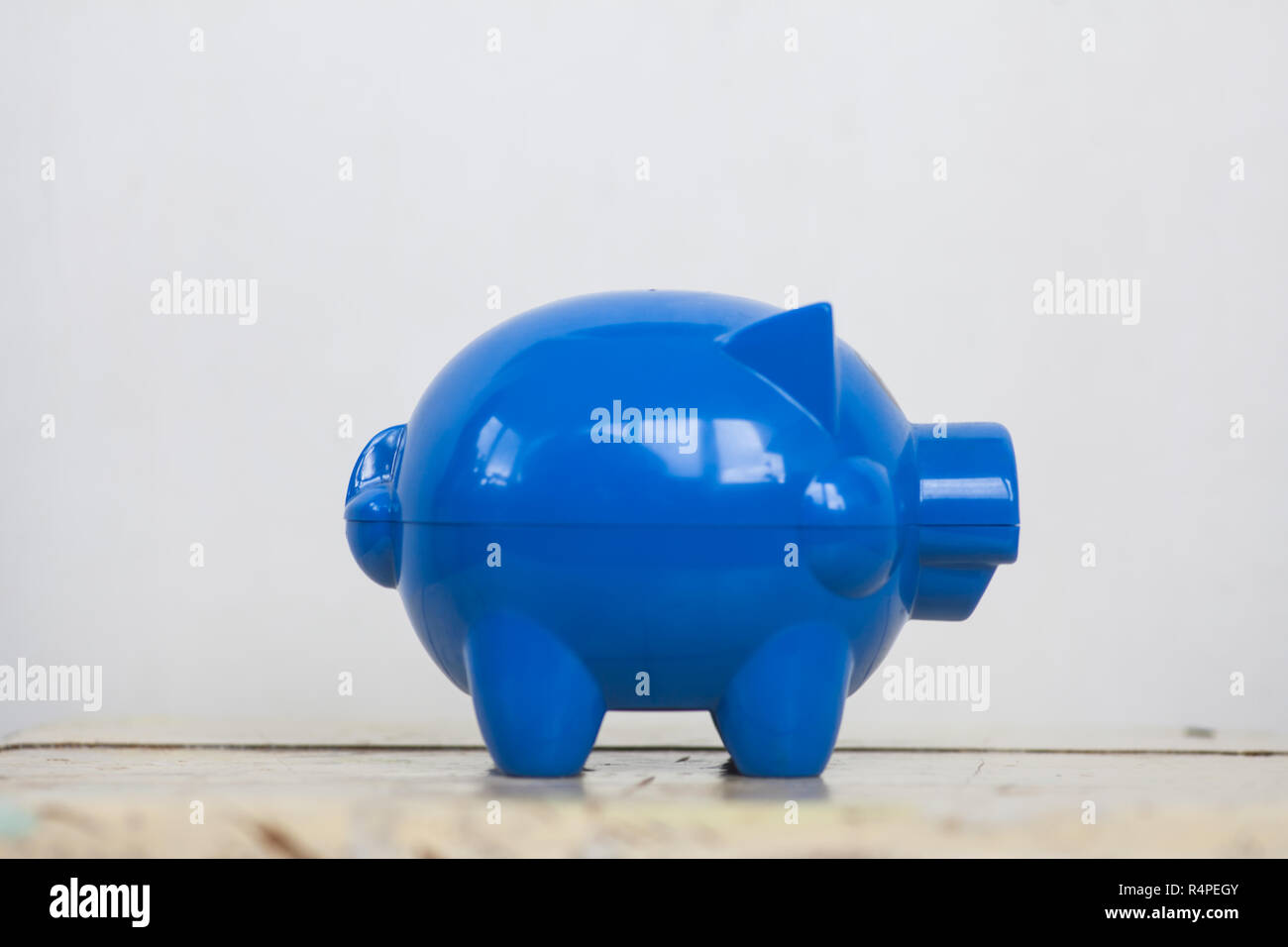 Blue piggy bank Stock Photo - Alamy