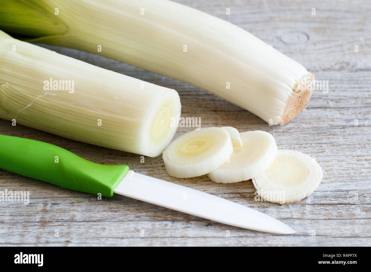 Fresh leeks whole and sliced Stock Photo - Alamy