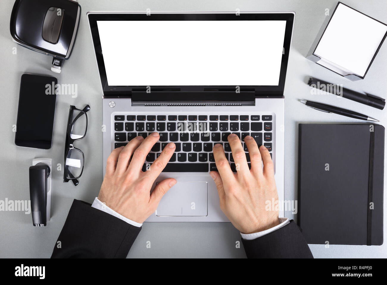 Person using stapler hi-res stock photography and images - Alamy