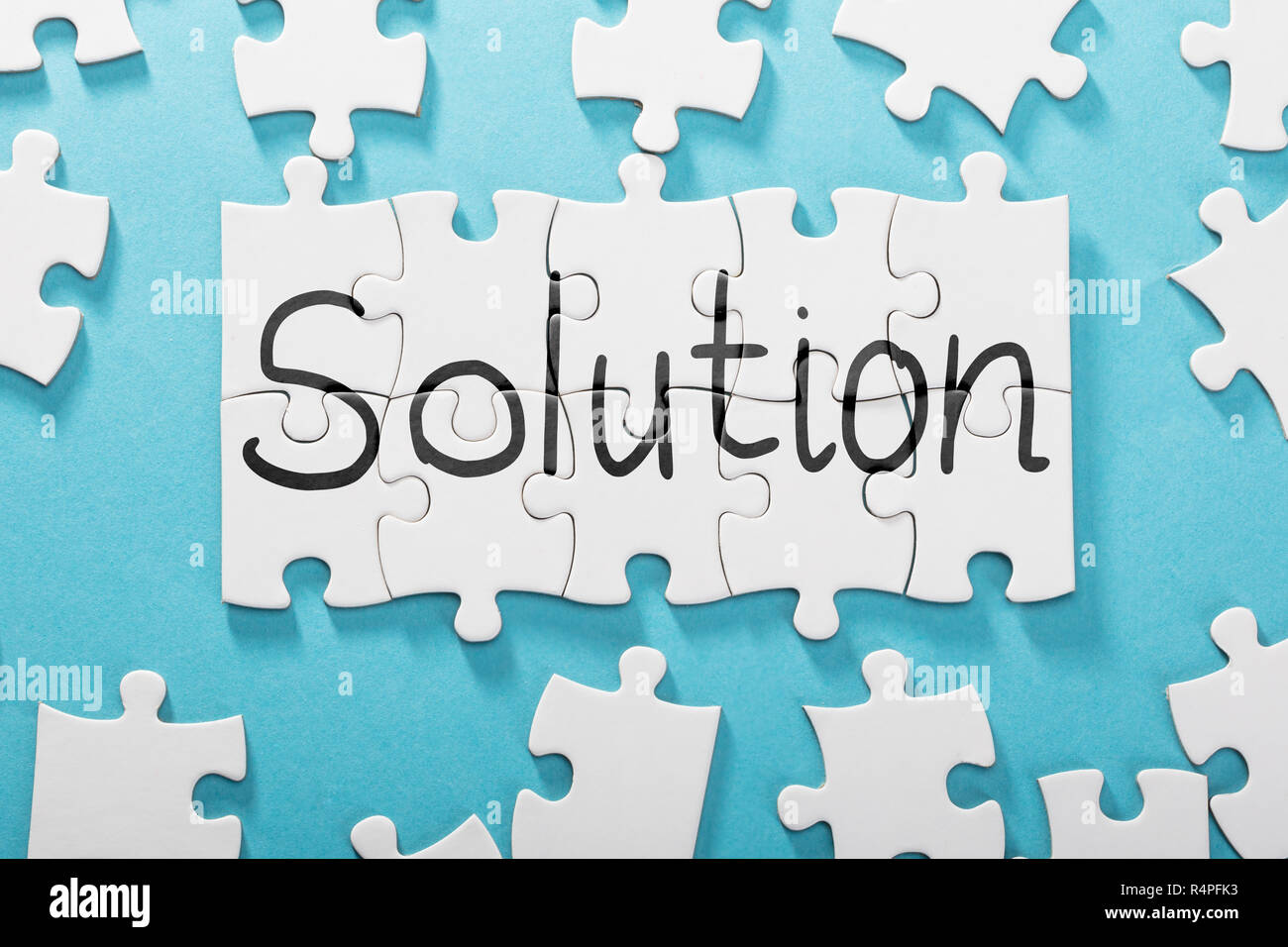 Solution Word Made With Puzzle Stock Photo - Alamy