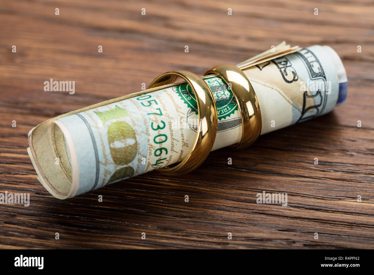 Rolled up dollar notes hi-res stock photography and images - Alamy