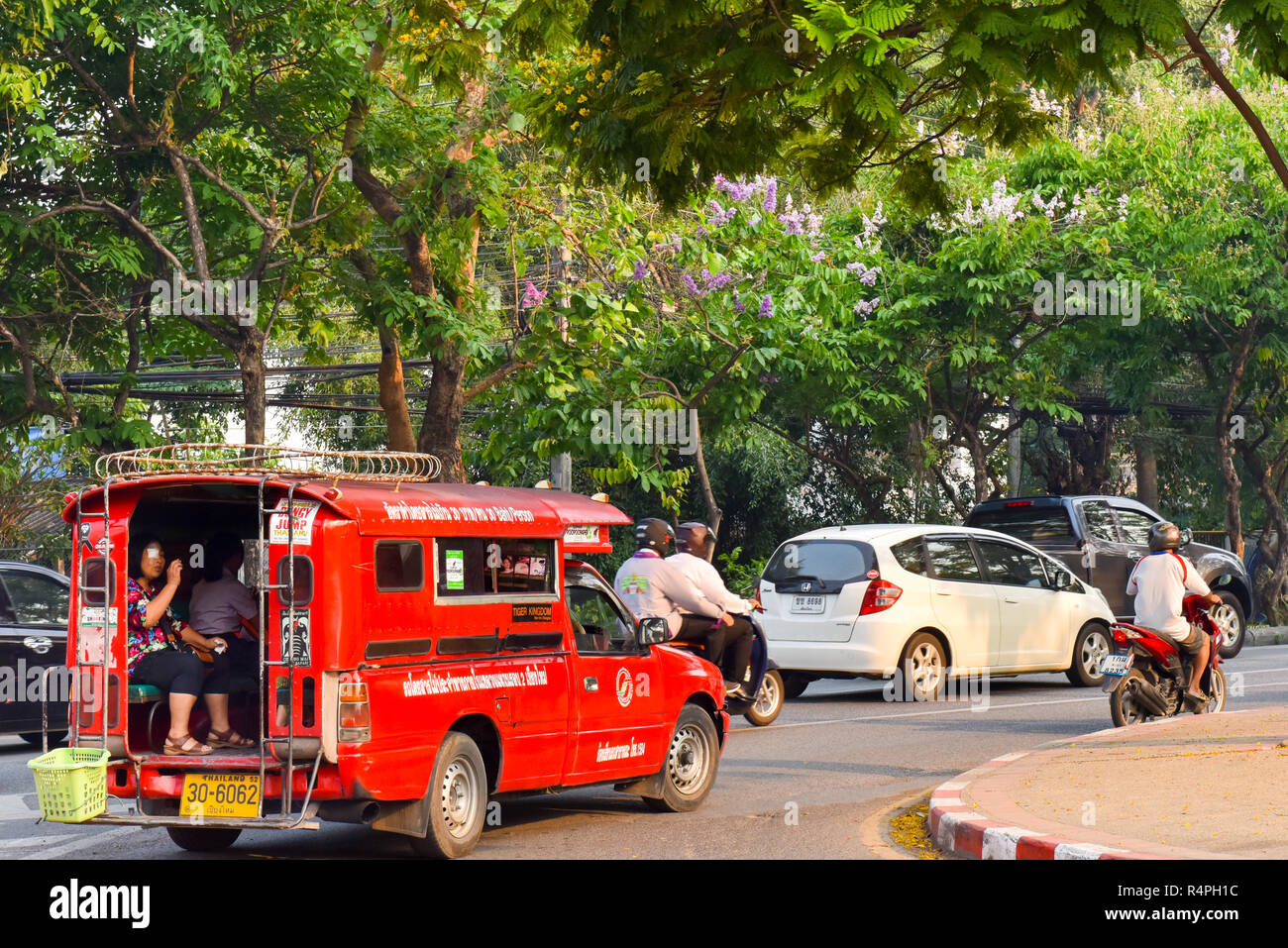 Typical red songthaew taxi, Chiang Mai Stock Photo - Alamy