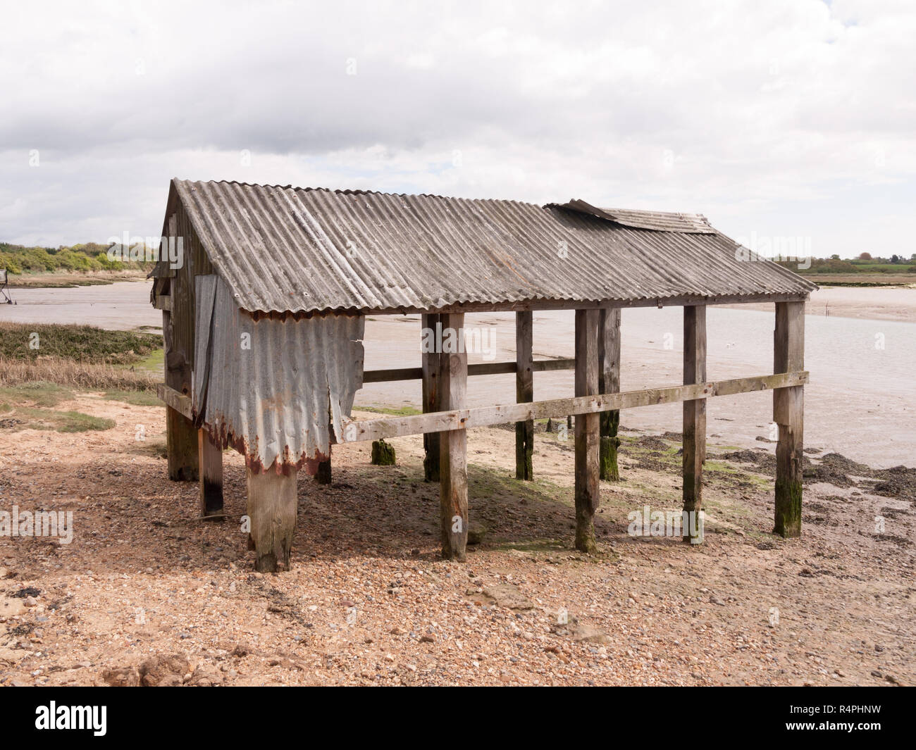 an old and abandoned sea shack shed decaying and rotting Stock Photo ...