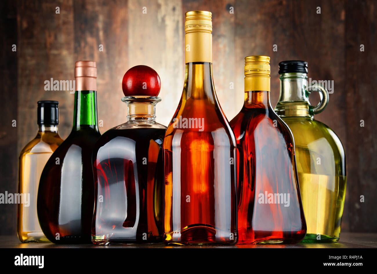 Bottles of assorted alcoholic beverages Stock Photo - Alamy