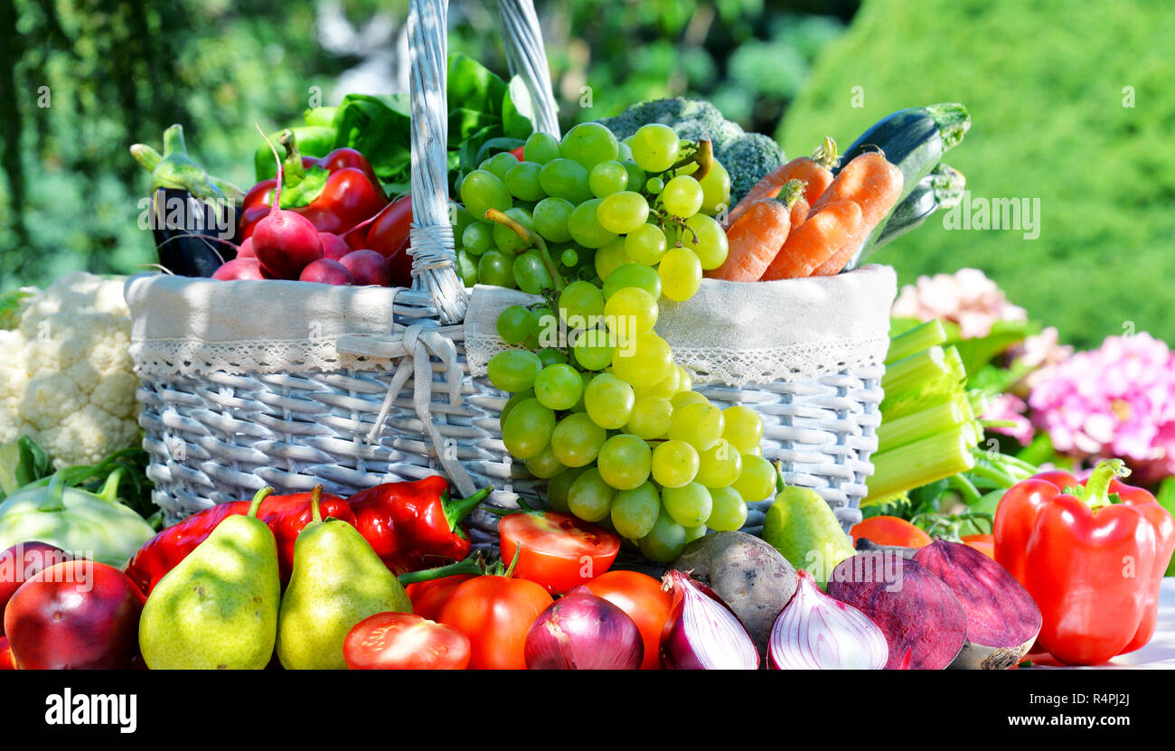 Fresh organic vegetables and fruits in the garden Stock Photo - Alamy