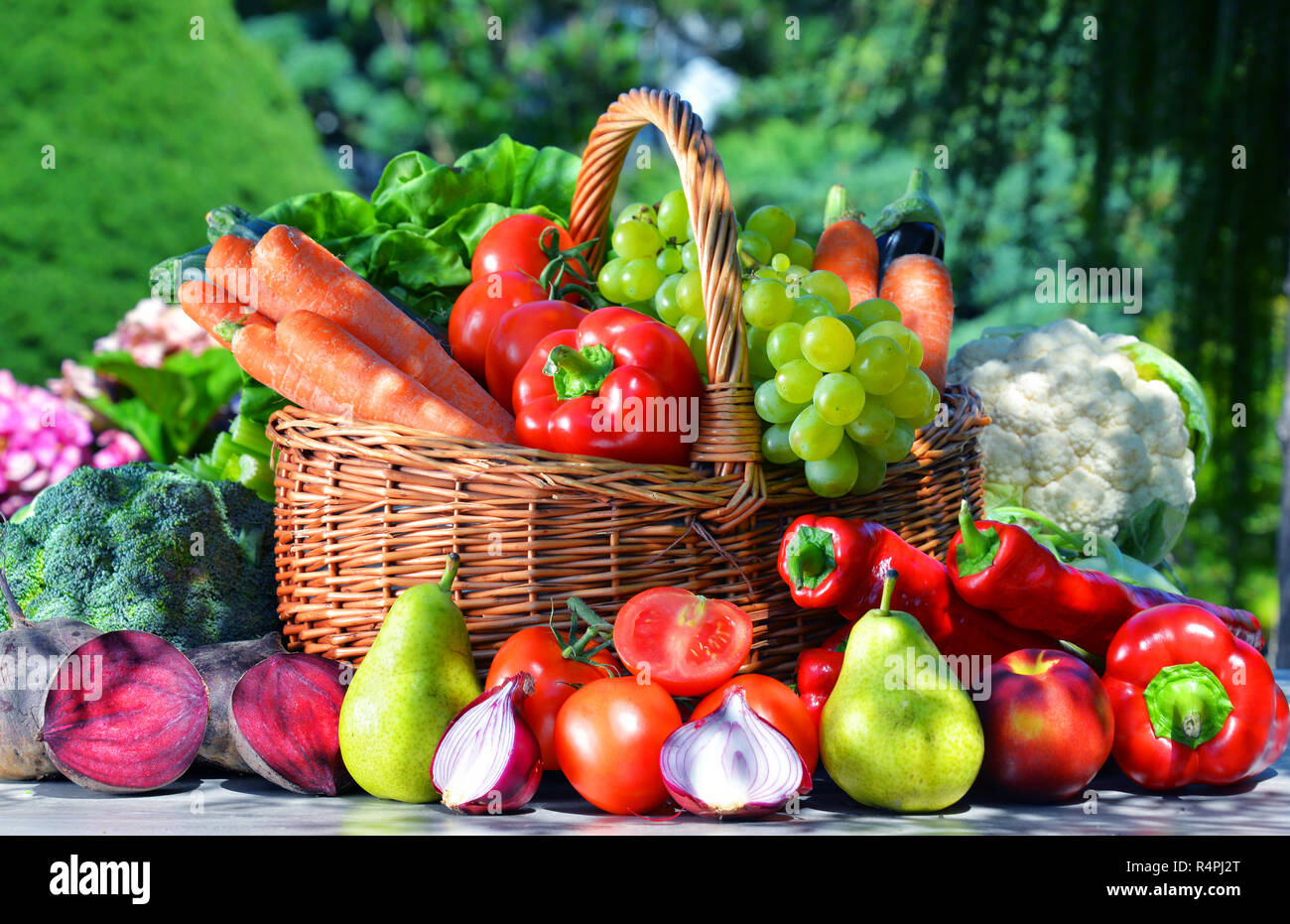 Fresh organic vegetables and fruits in the garden Stock Photo - Alamy
