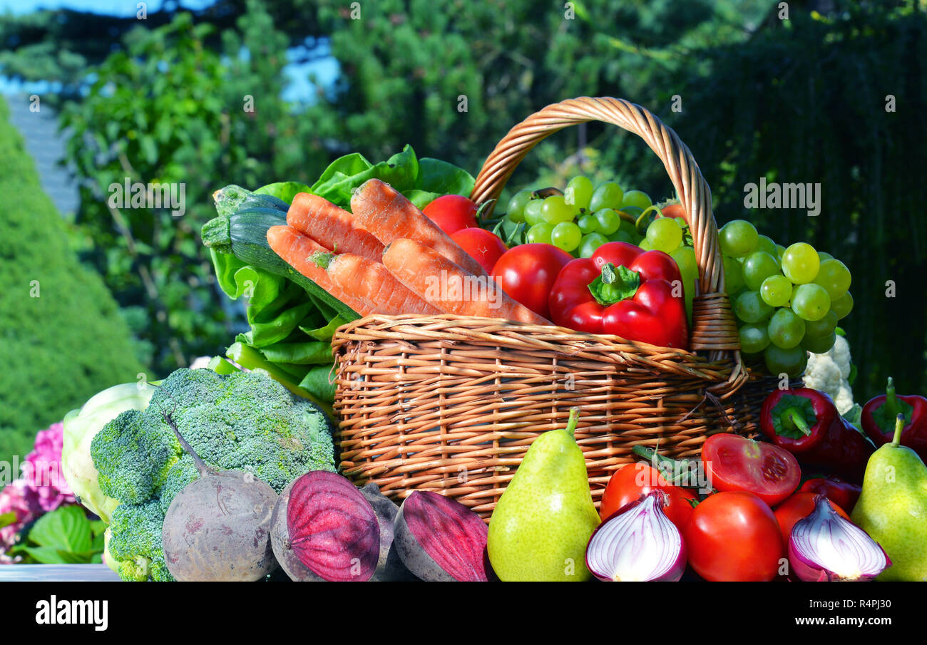 Fresh organic vegetables and fruits in the garden Stock Photo - Alamy