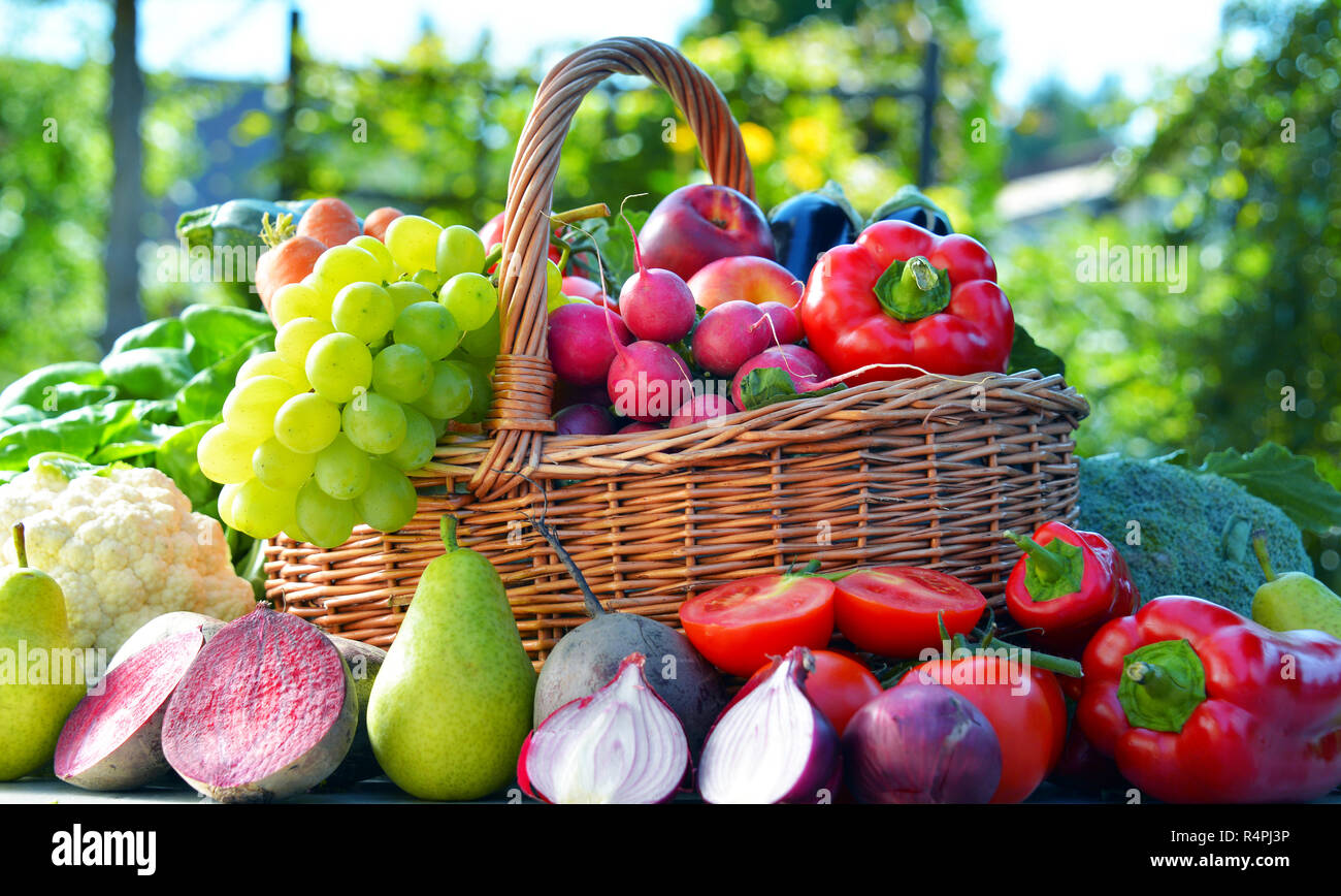 Fresh organic vegetables and fruits in the garden Stock Photo - Alamy