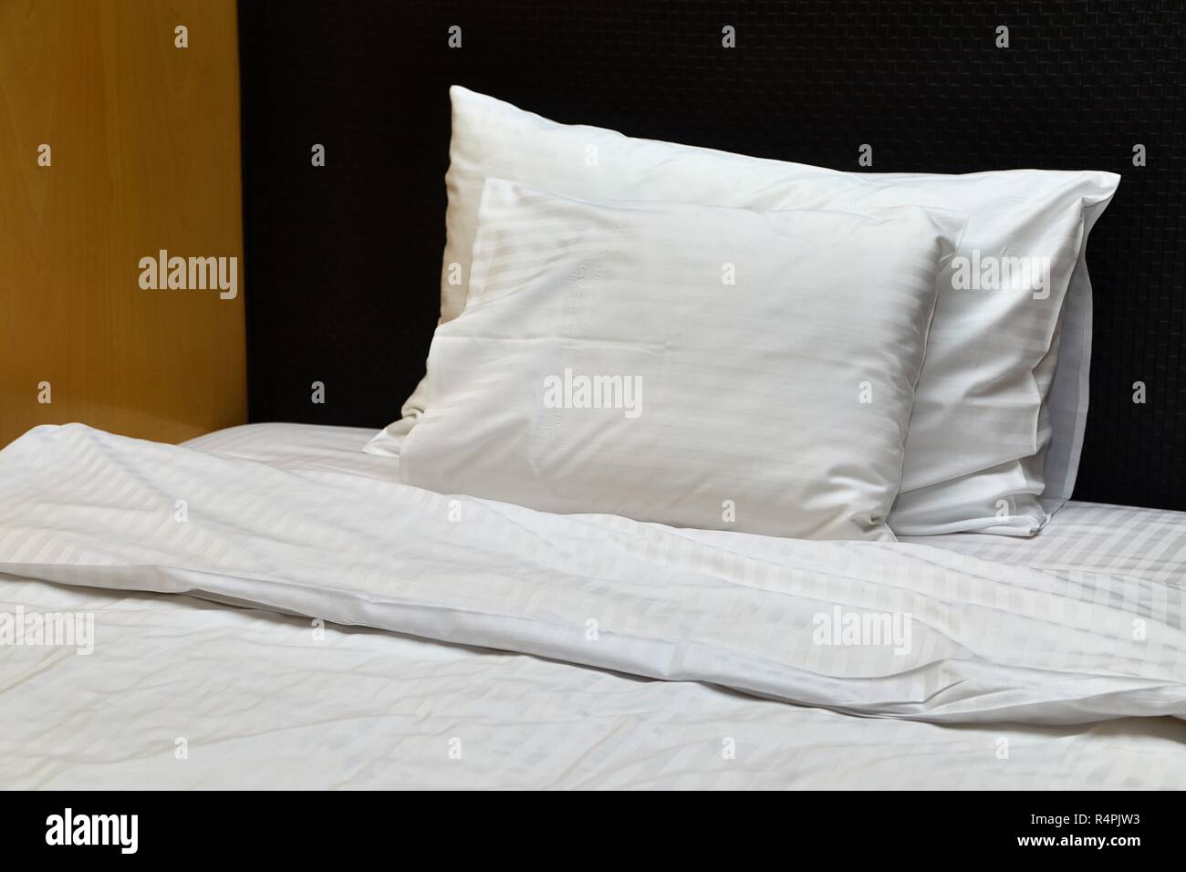 Hotel bed closeup Stock Photo - Alamy