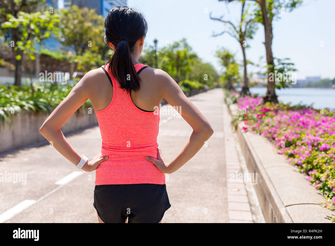 Back view of Sport woman ready to run Stock Photo - Alamy