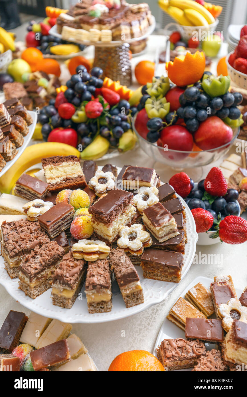Delicious sweets and fruits Stock Photo - Alamy
