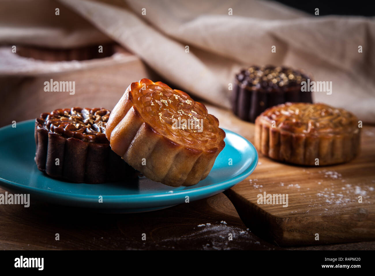 Mid autumn festival eating mooncakes hi-res stock photography and ...