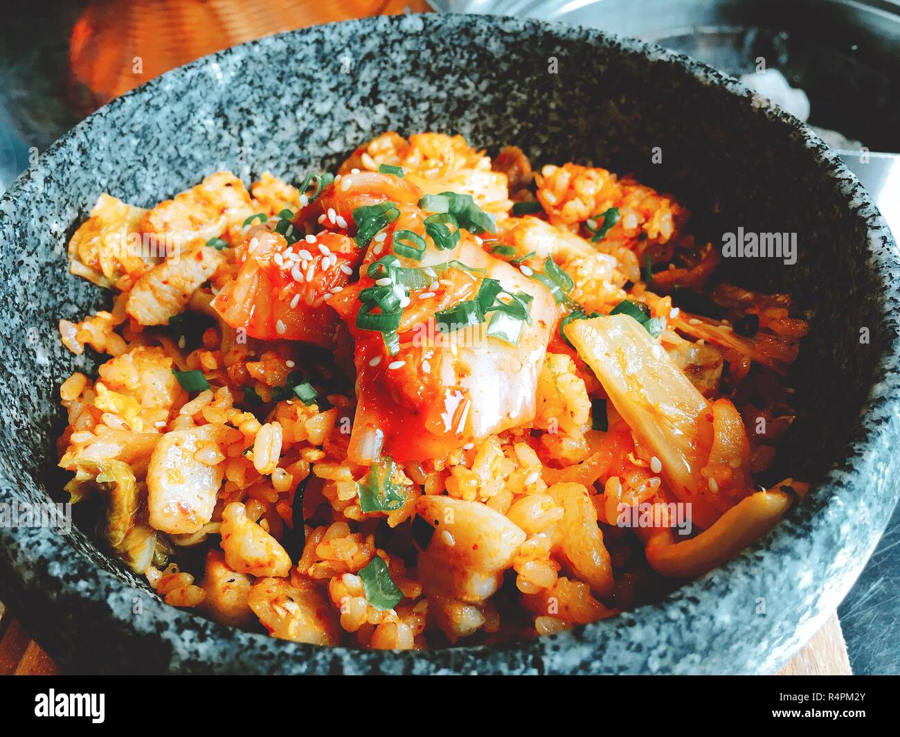 Hot bowl of Kimchi rice in Korean style Stock Photo - Alamy