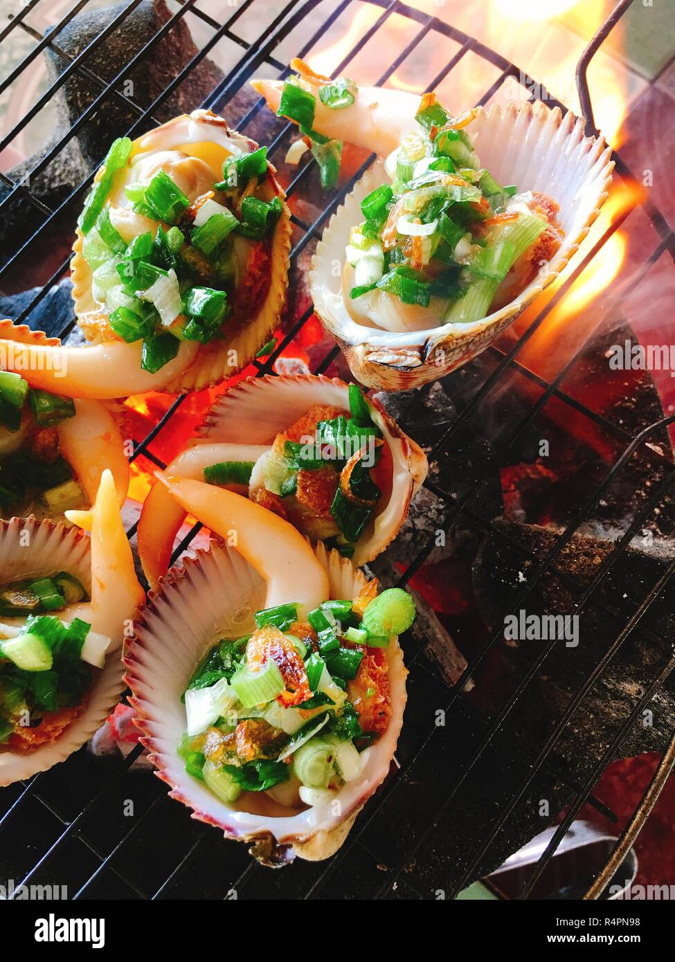 Cooking clams on the fire High Resolution Stock Photography and Images ...