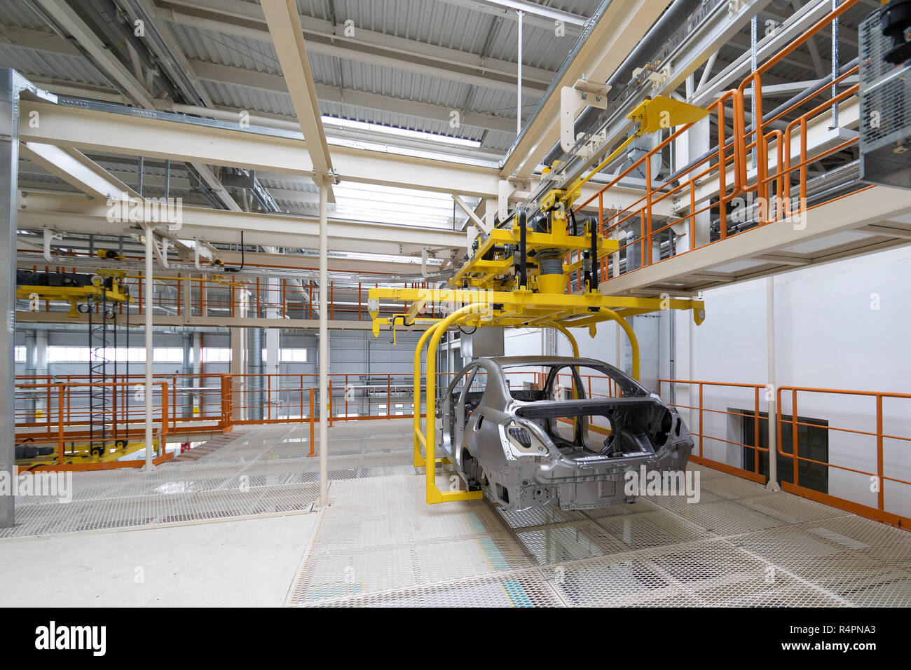 body of car on conveyor Modern Assembly of cars at plant. automated ...