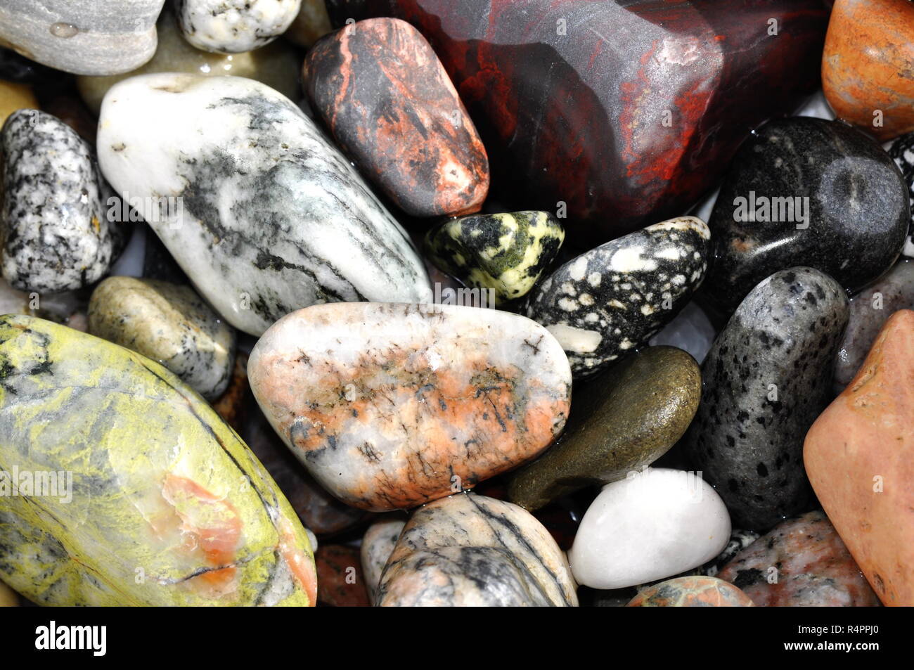 Colorful polished pebbles Stock Photo - Alamy