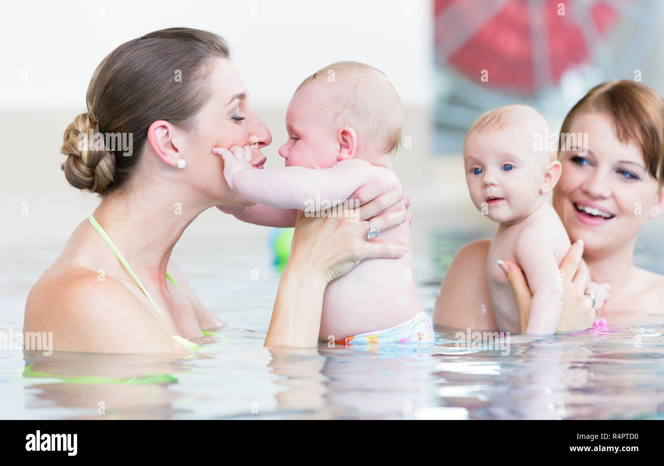 Infant swimming hi-res stock photography and images - Alamy