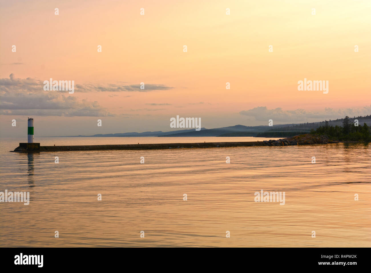 Calm Waters at Sunset on a Harbor Breakwater of Grand Marais, Minnesota ...