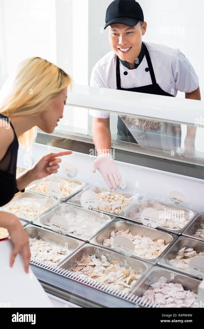 Customer serving food buffet counter hi-res stock photography and ...