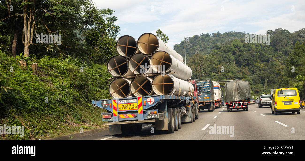 Malaysia. Truck Traffic Going North on Highway AH2 between Ipoh and ...