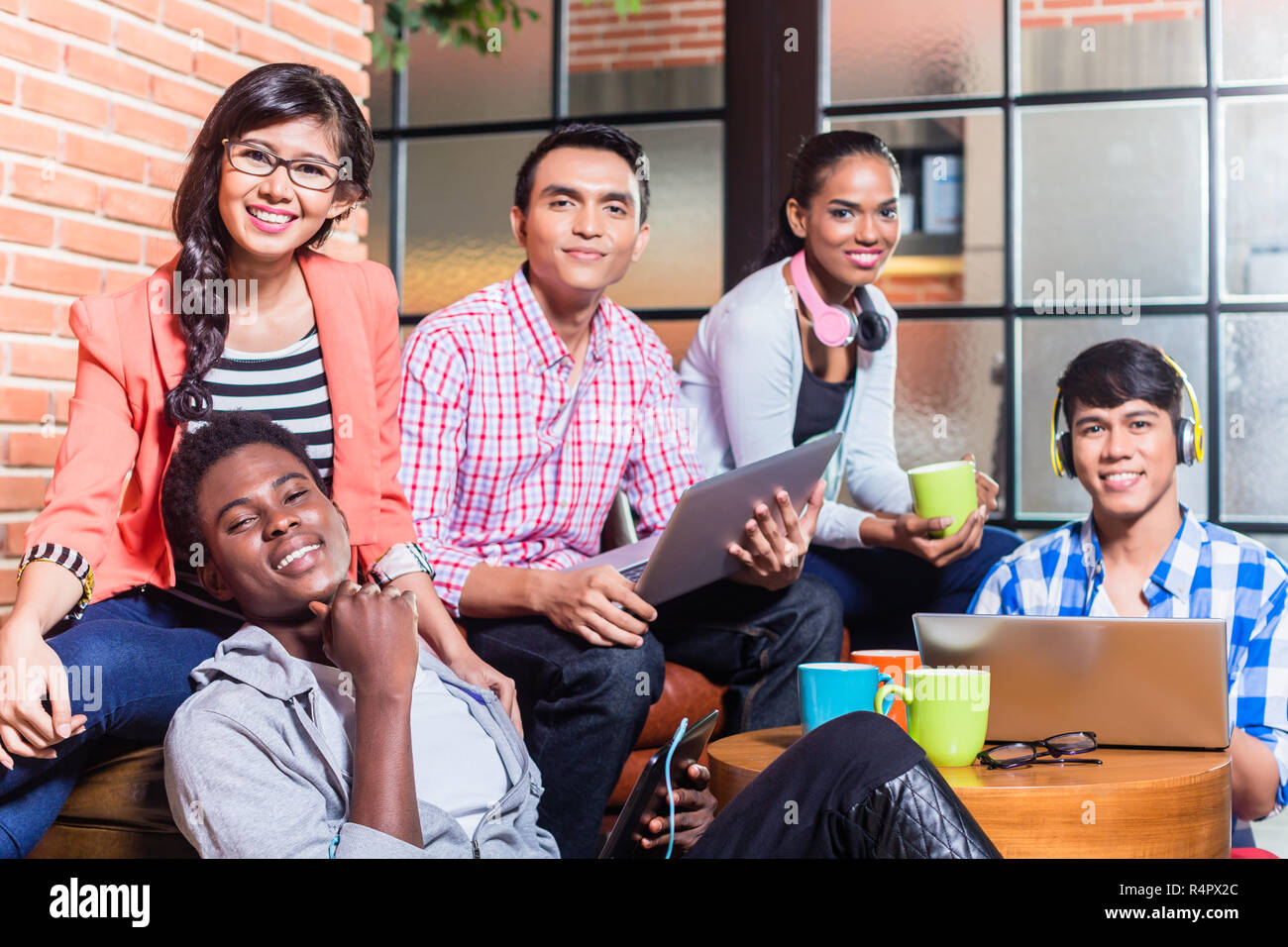 Group of diversity college students learning on campus Stock Photo - Alamy
