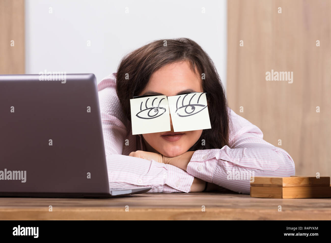 Sleeping Businesswoman Covering His Eyes With The Sticky Notes Stock ...