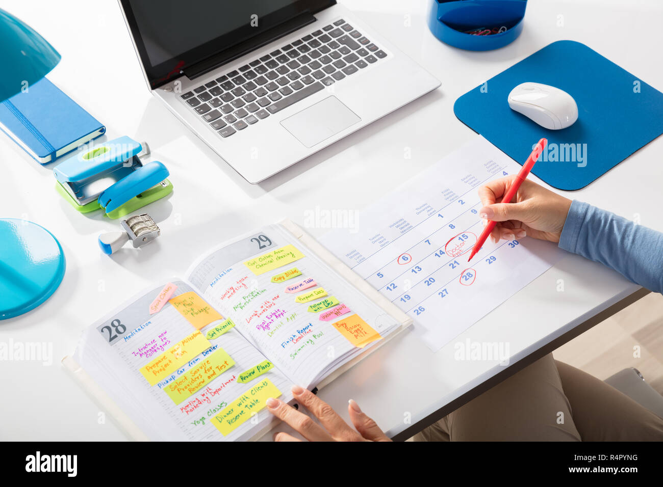 One woman marking the date calendar hi-res stock photography and images ...