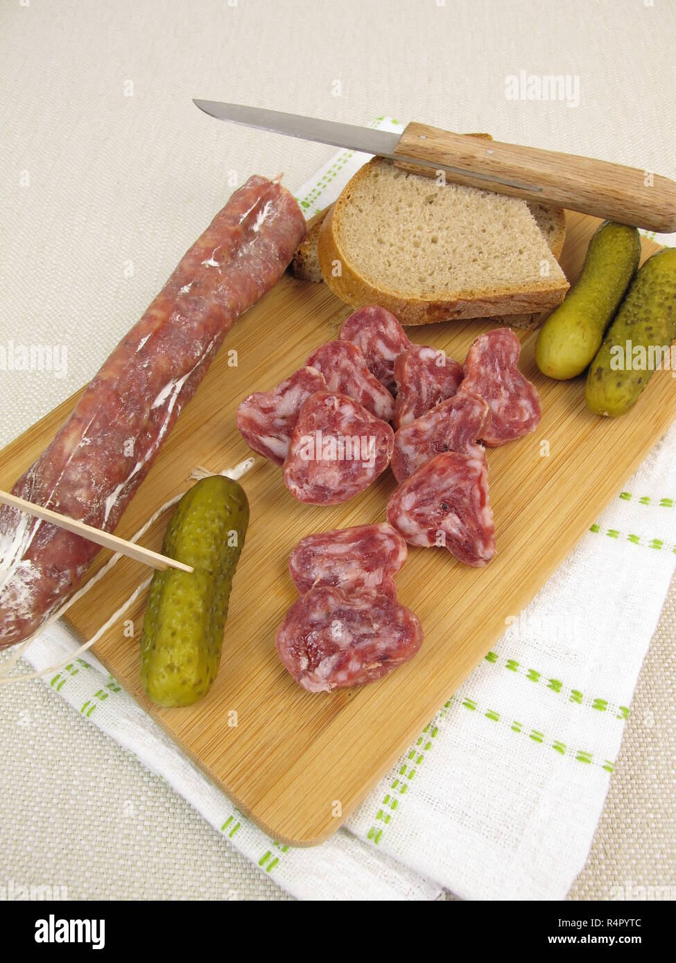 fuet salami with noble mold,gherkins and bread Stock Photo - Alamy