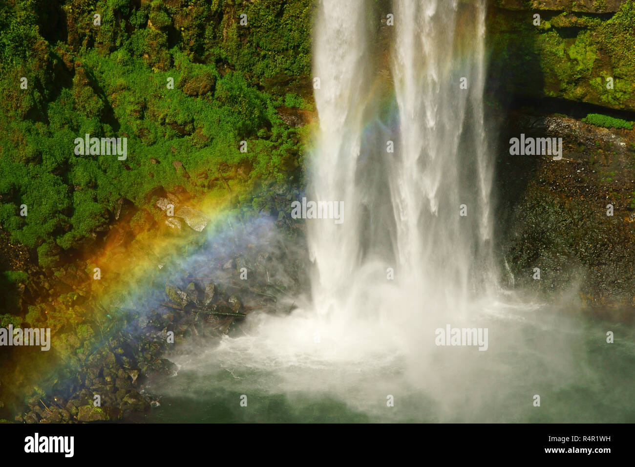 Waterfall with Rainbow Stock Photo - Alamy