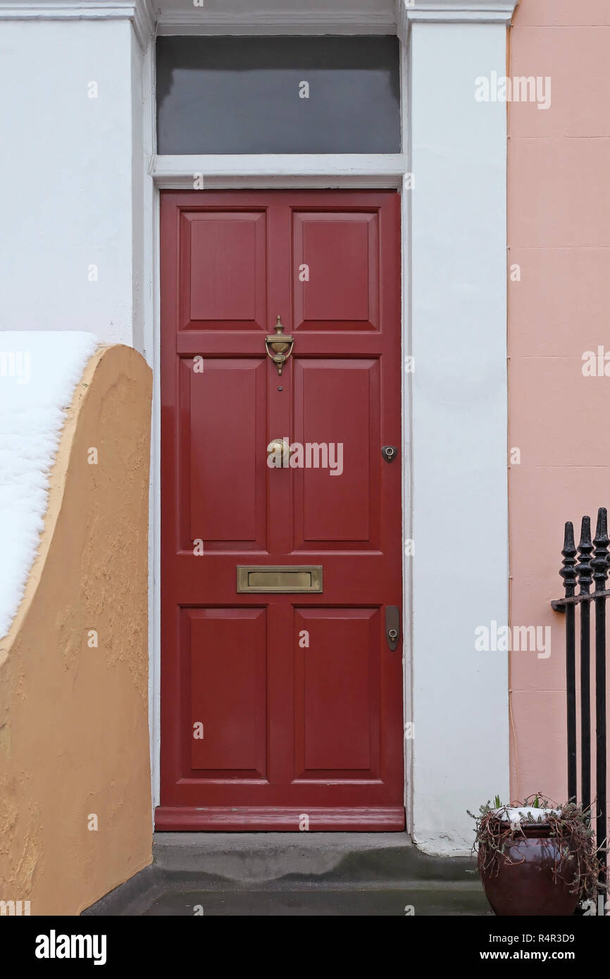 Closed red door Stock Photo - Alamy