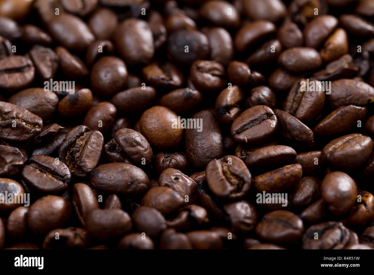 Roasted coffee bean texture Stock Photo - Alamy