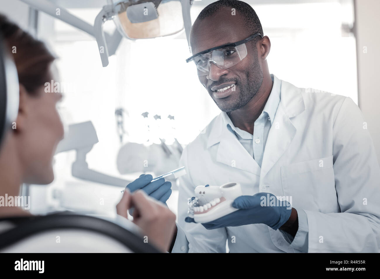 Dentist talking scared young hi-res stock photography and images - Alamy