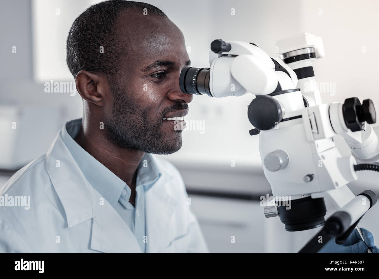 Portrait of delighted practitioner that working with pleasure Stock ...