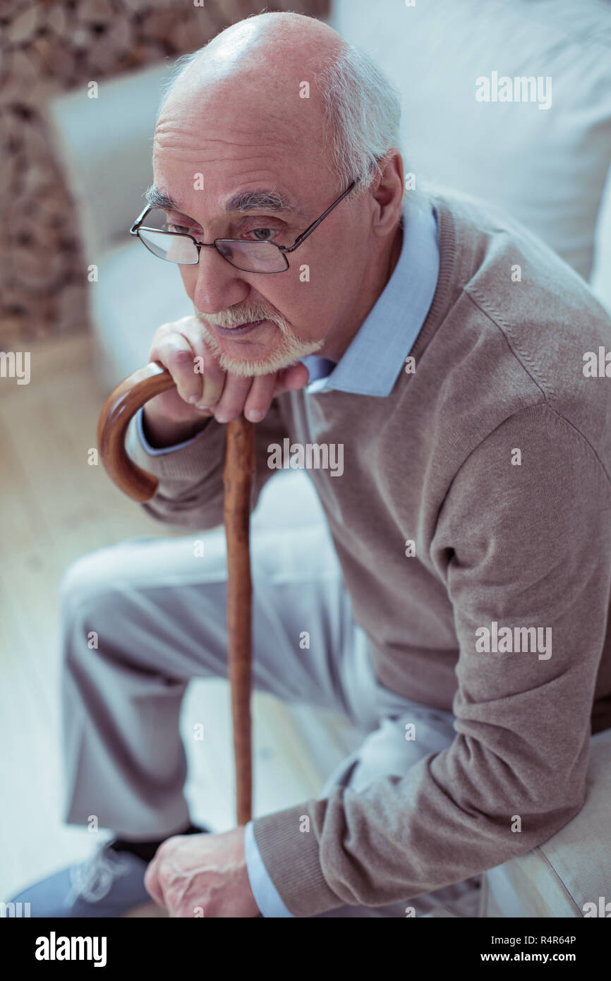 Top view picture of old man that sitting on sofa Stock Photo - Alamy