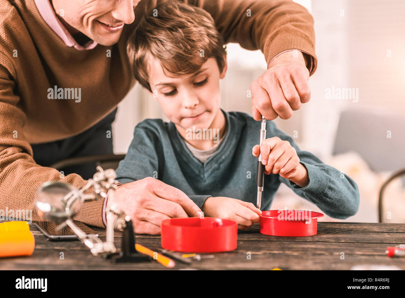 Quick learner kid working an advanced instrument almost perfectly Stock ...