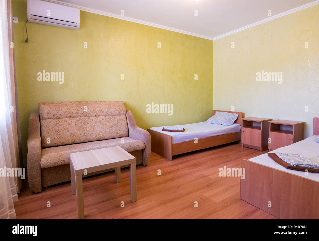 Interior small hotel room Stock Photo - Alamy