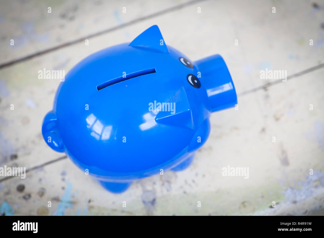 Blue piggy bank Stock Photo - Alamy