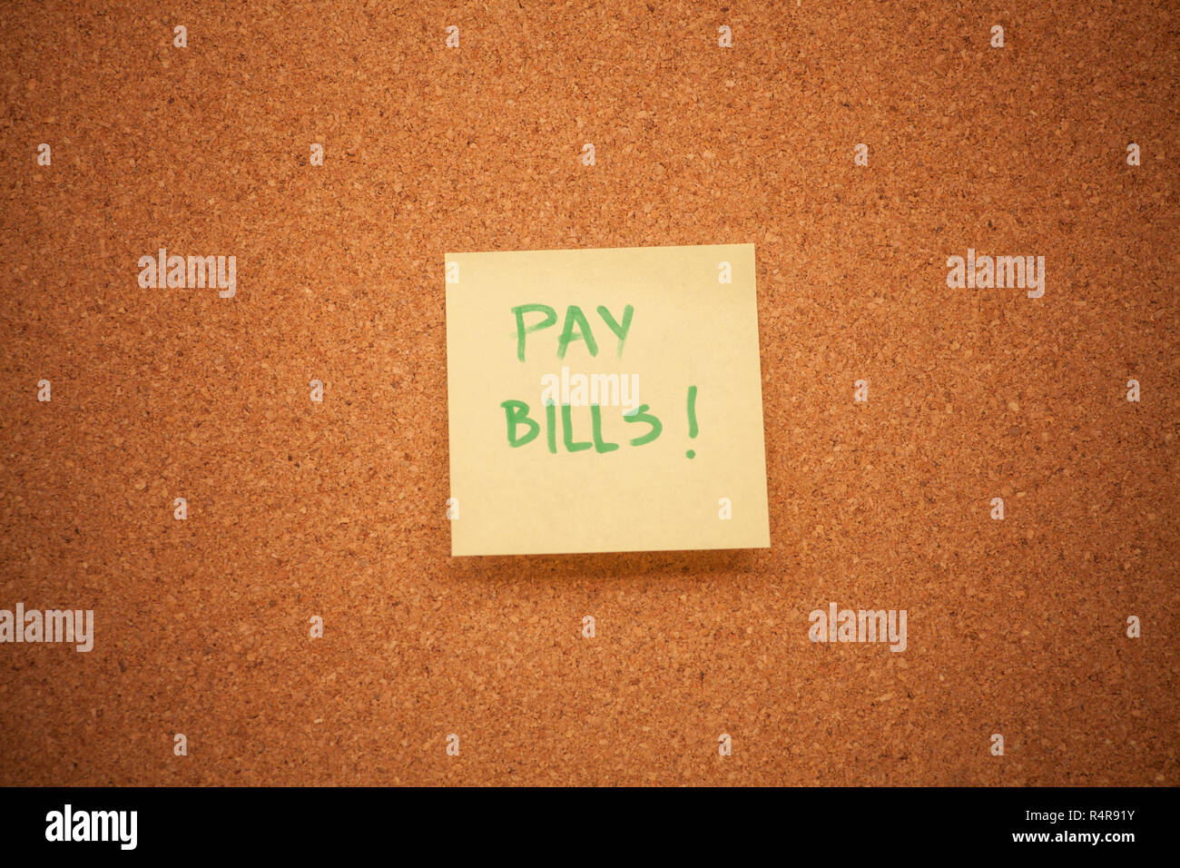 Pay the bills note Stock Photo - Alamy