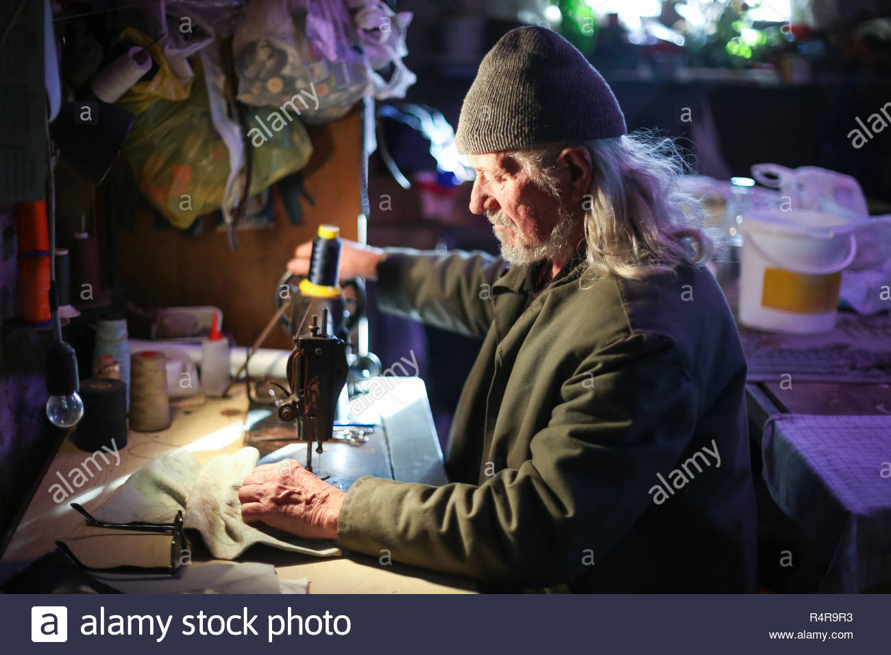 Old Age Elderly People Sewing Stock Photos & Old Age Elderly People ...