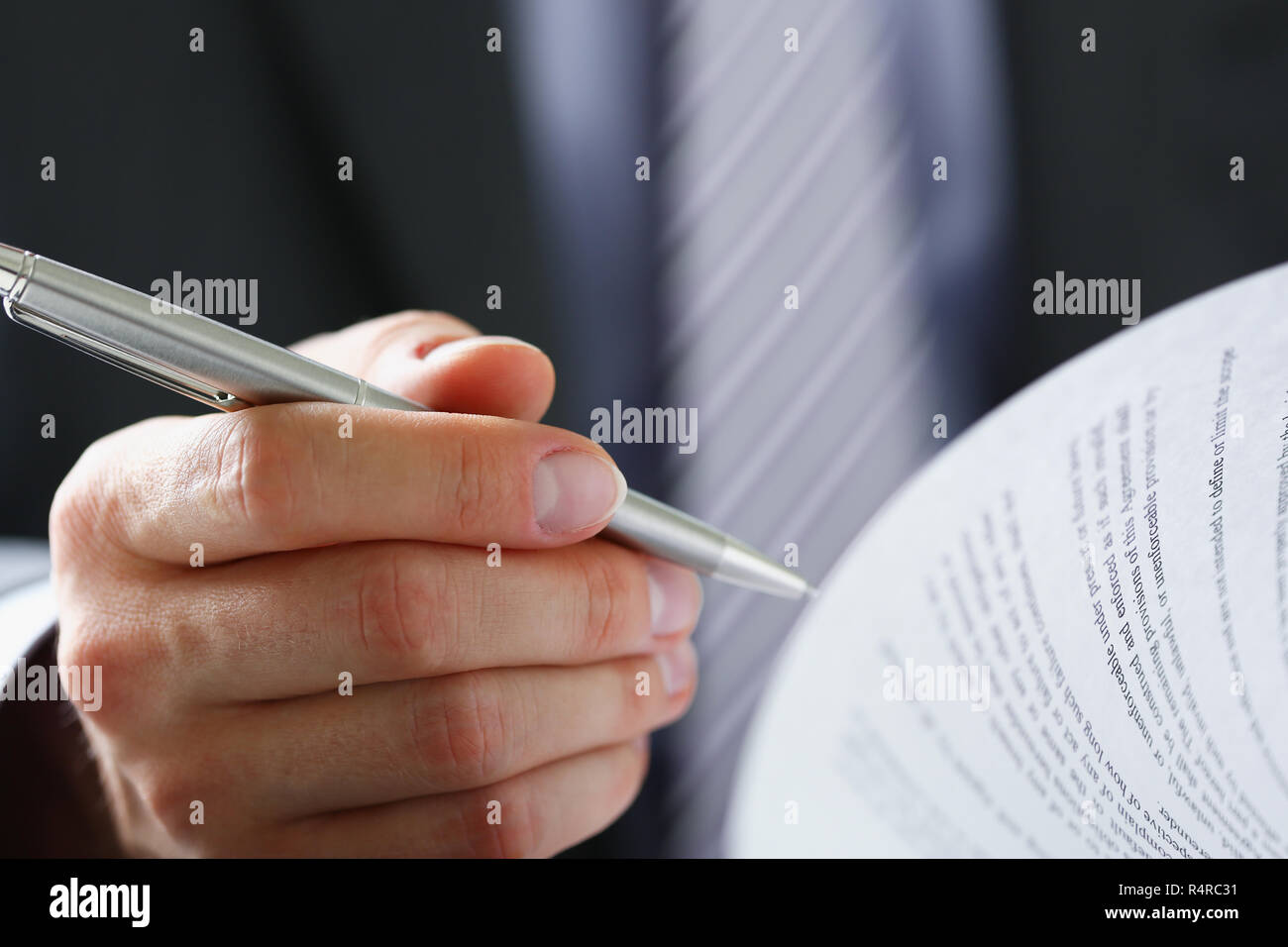 Male arm in suit and tie fill form clipped Stock Photo - Alamy
