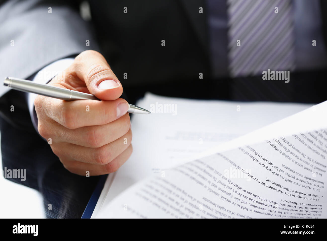 Male arm in suit and tie fill form clipped Stock Photo - Alamy