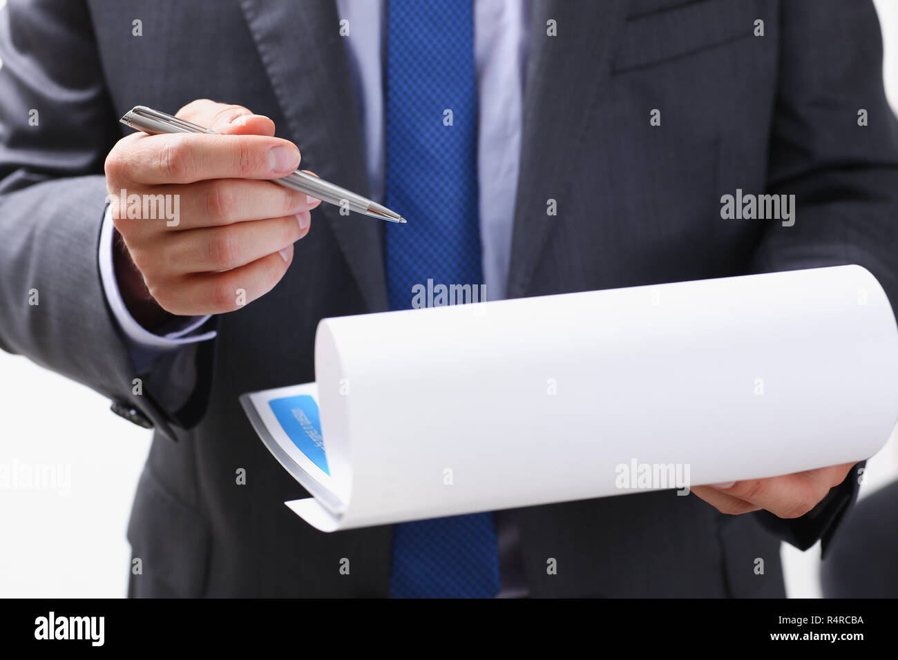 Male arm in suit and tie fill form clipped Stock Photo - Alamy