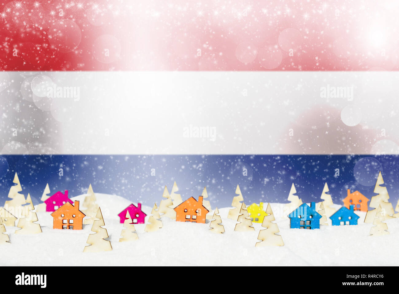 Christmas background with Netherlands flag, small wooden houses ...