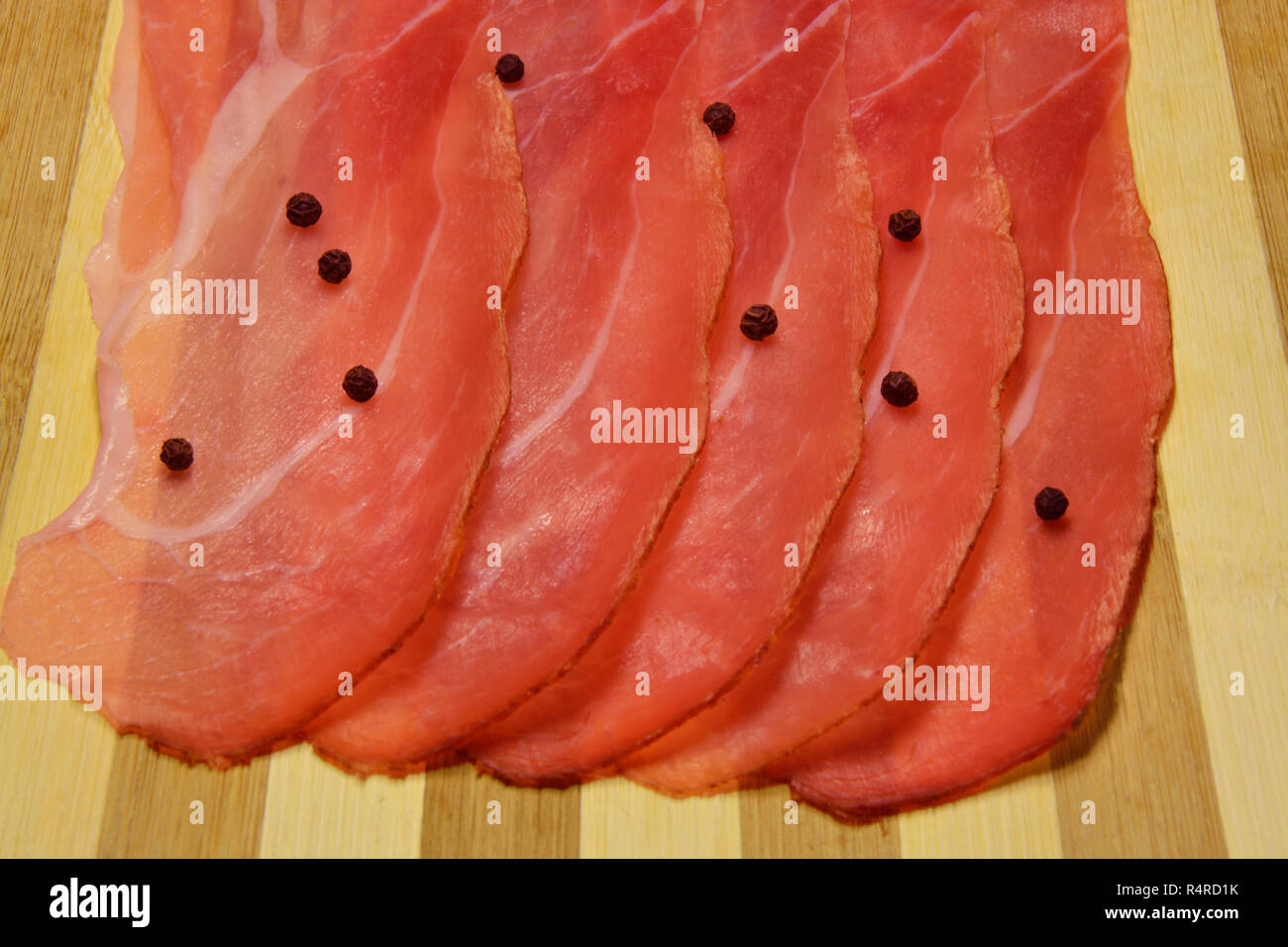 Italian speck, smoked tasty ham Stock Photo - Alamy