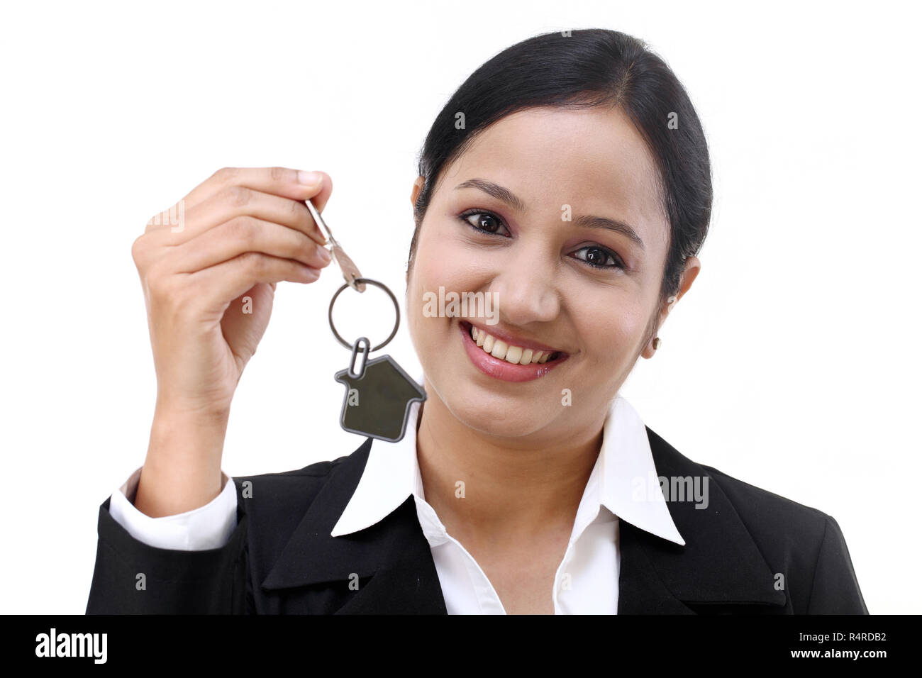 Woman with house key hi-res stock photography and images - Alamy