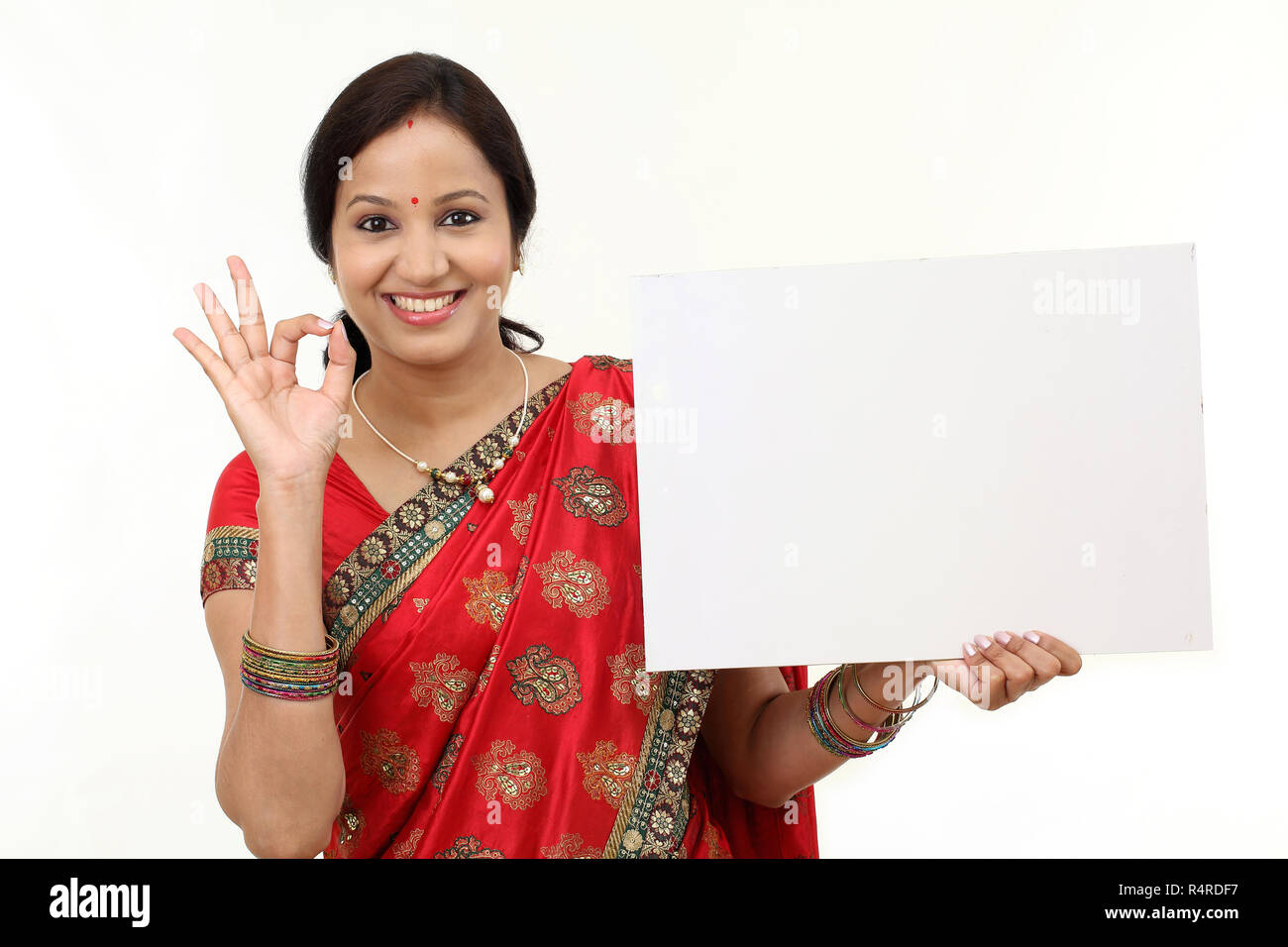 Traditional indian woman showing ok hi-res stock photography and images ...