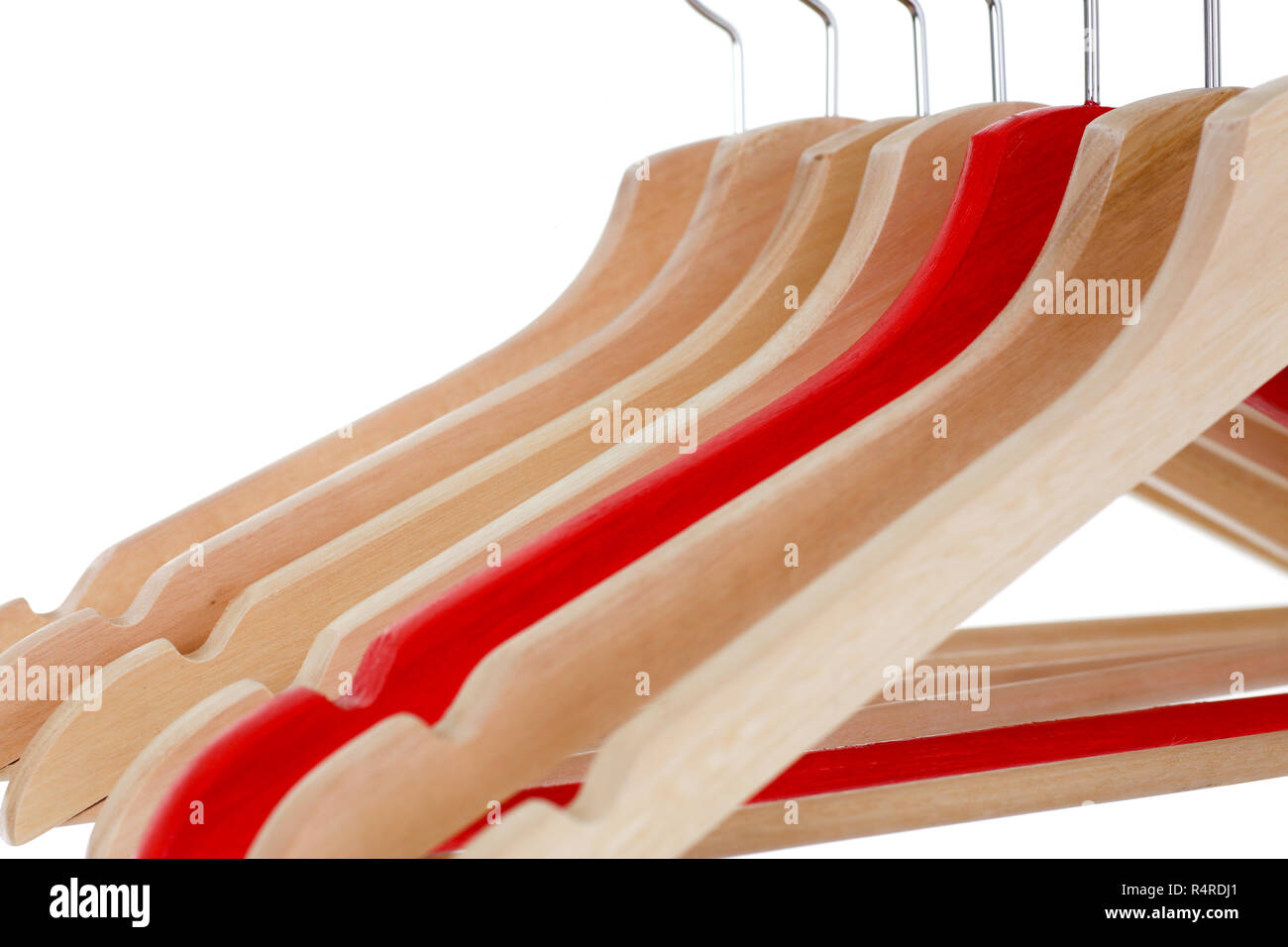 Red and wooden hanger hanging on metal Stock Photo - Alamy